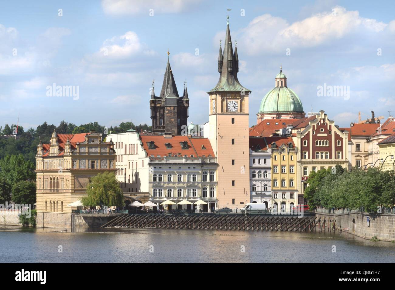 Iconic architecture by the Vltava river near Charles bridge in Prague ...