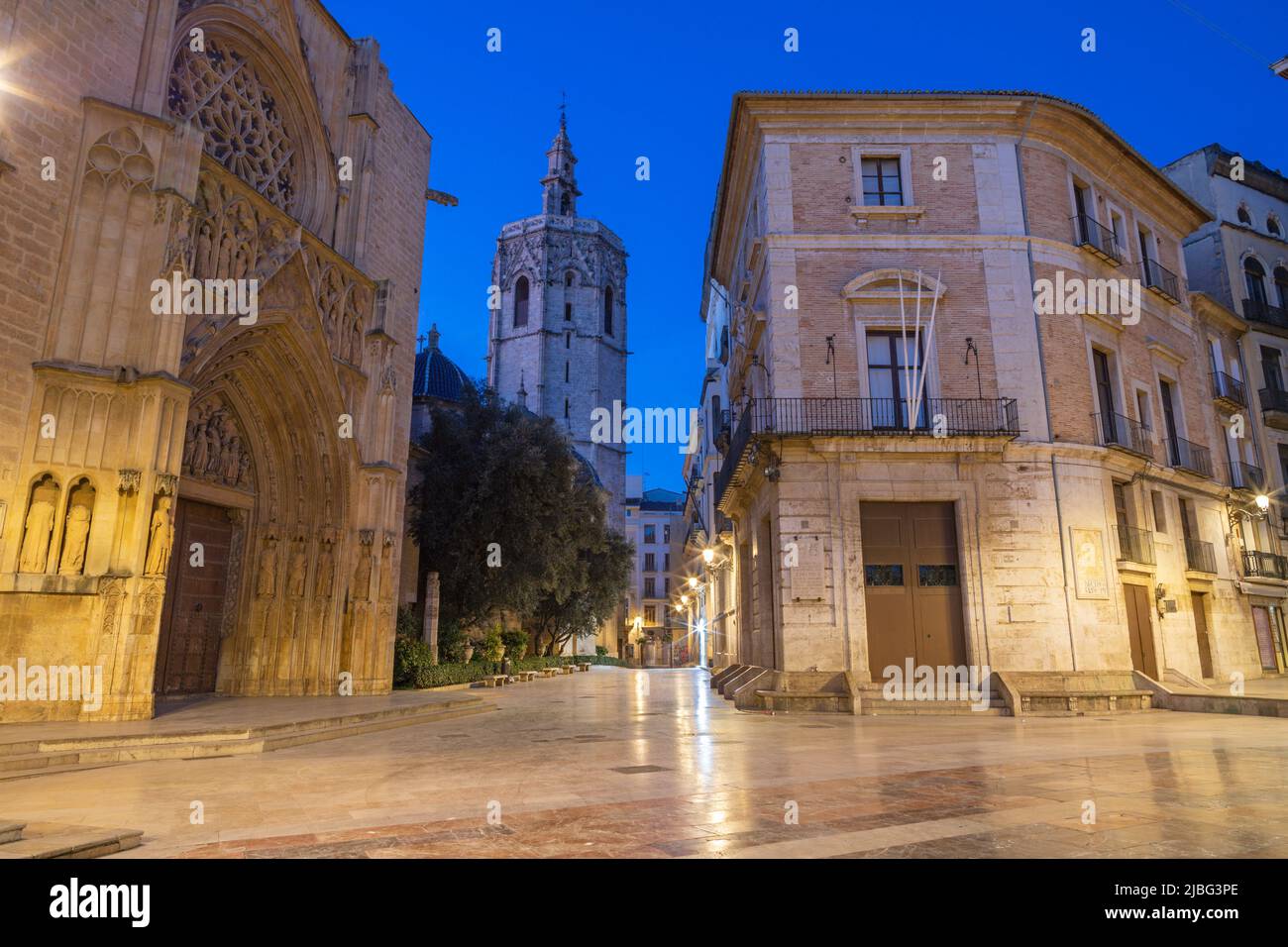 Valencia - The square Plaza de Mare de Deu with the Cathedral at dusk ...