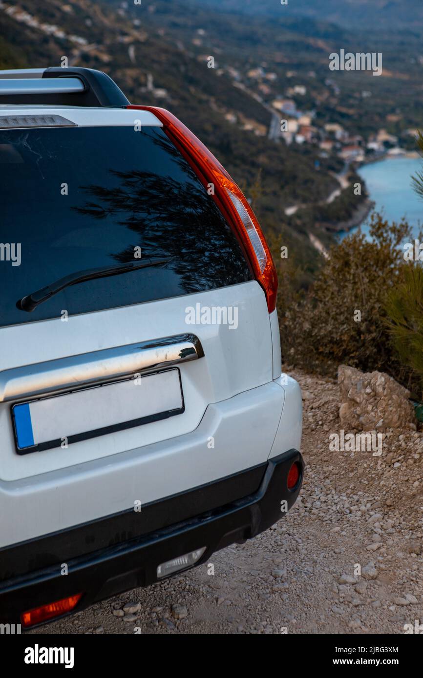 suv car at the edge road trip concept copy space Lefkada island Greece ...
