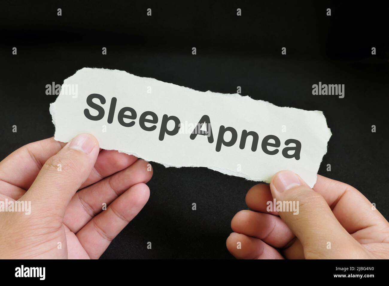 Sleep Apnea sleeping disorder diagnosis concept. Hand holding paper ...