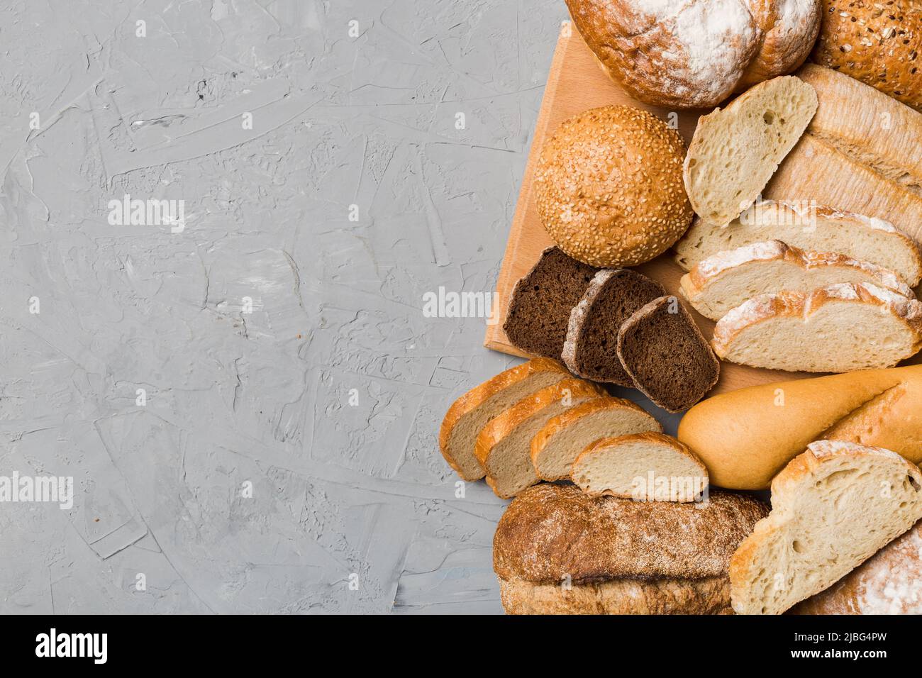 Homemade natural breads. Different kinds of fresh bread as background ...