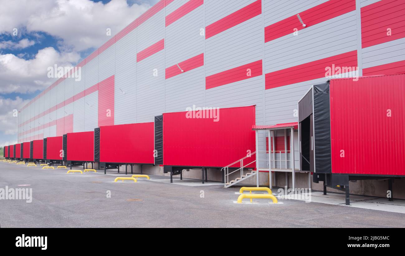 Entrance ramps of a large distribution warehouse with gates for loading ...