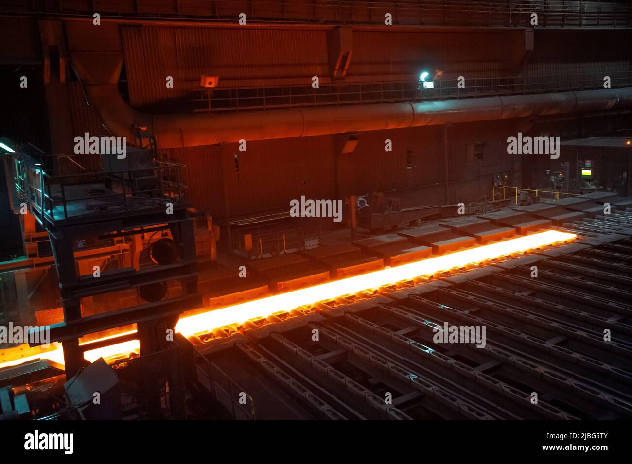 Metallurgical factory in Germany, hot rolled metal conveyor, sheet steel production Stock Photo ...