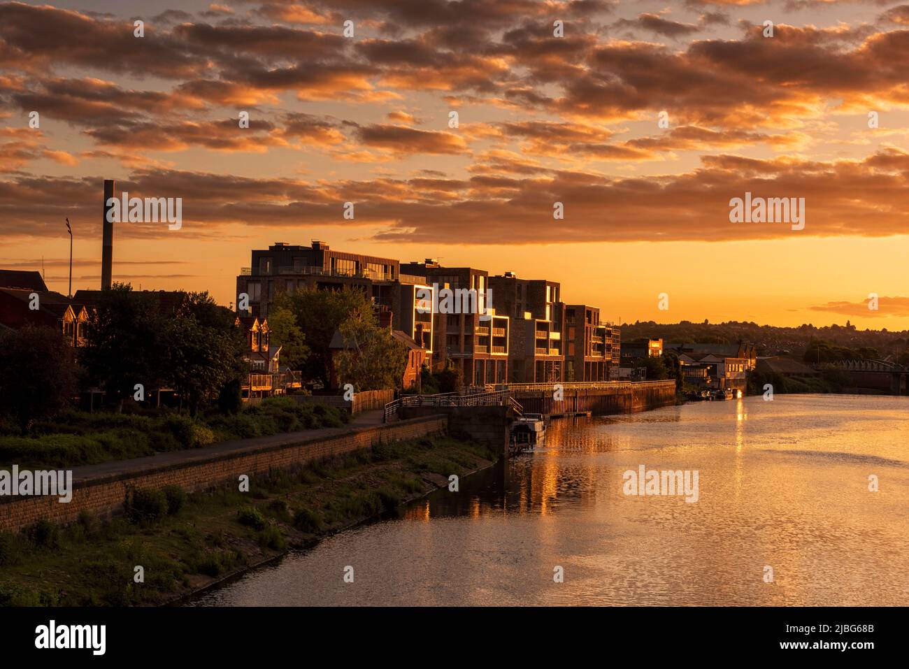 Sunrise over Trent Bridge Quays on the River Trent in Nottingham ...