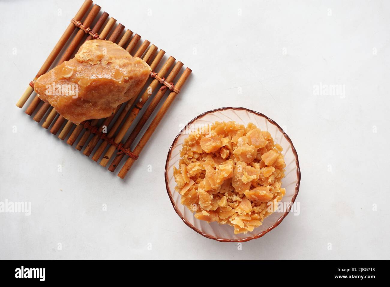 top view of jaggery traditional cane sugar cube on white background ...