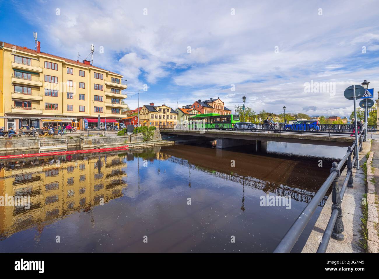 Beautiful view of city landscape with bridge over river flowing in ...