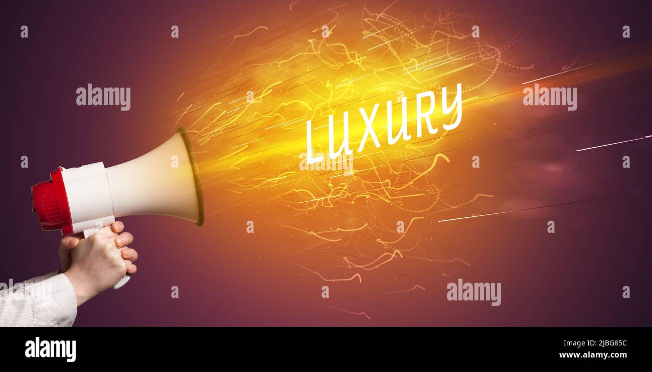 Young girld shouting in megaphone Stock Photo - Alamy