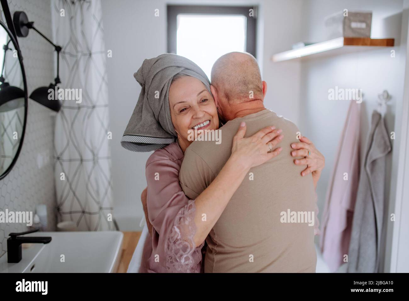 Woman man bathroom laugh hi-res stock photography and images - Alamy