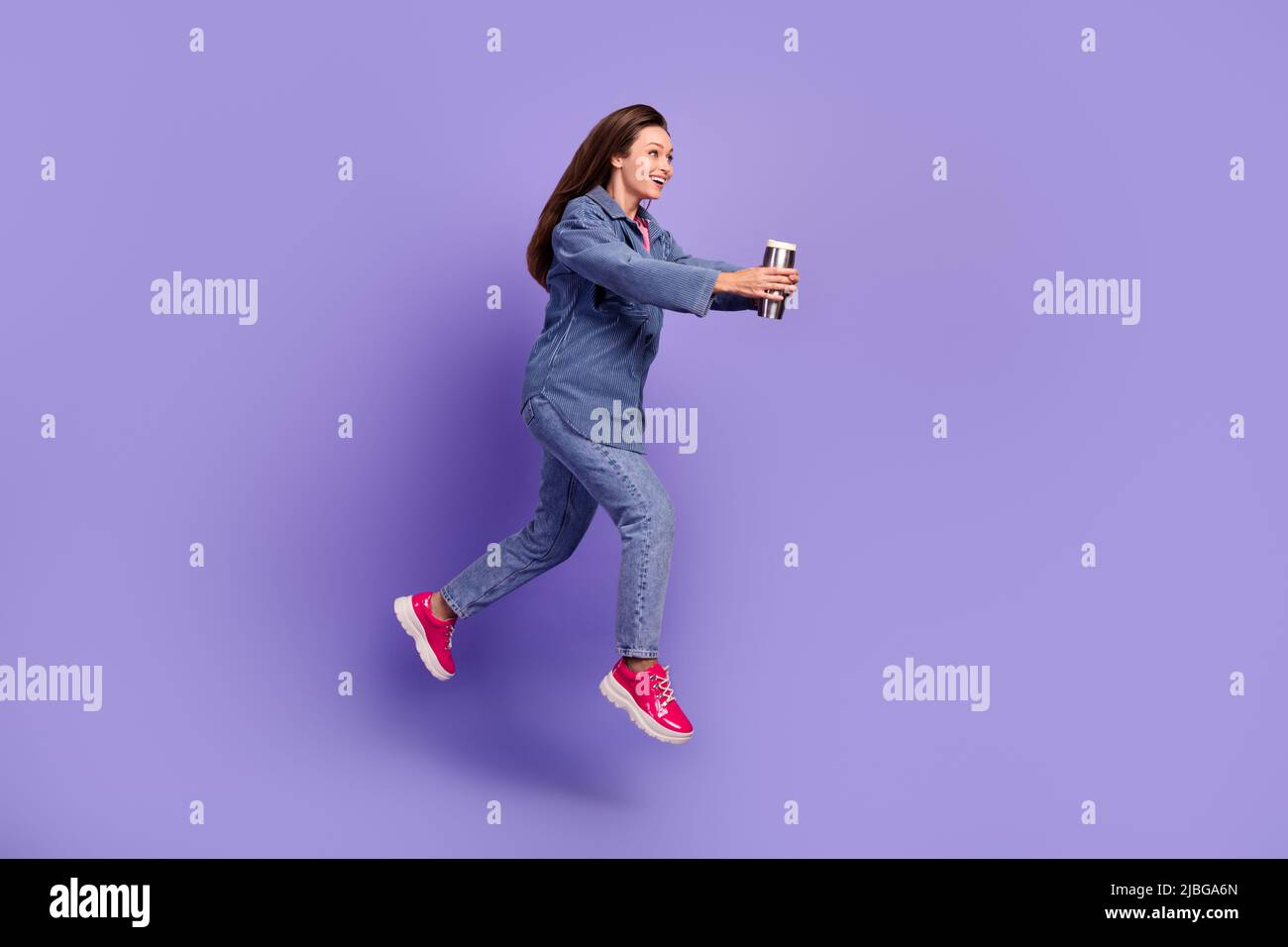 Full length profile photo of excited active person jump rush look empty ...