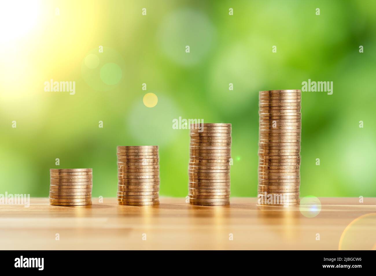 Close up Photo of constantly increasing coins on isolated background ...