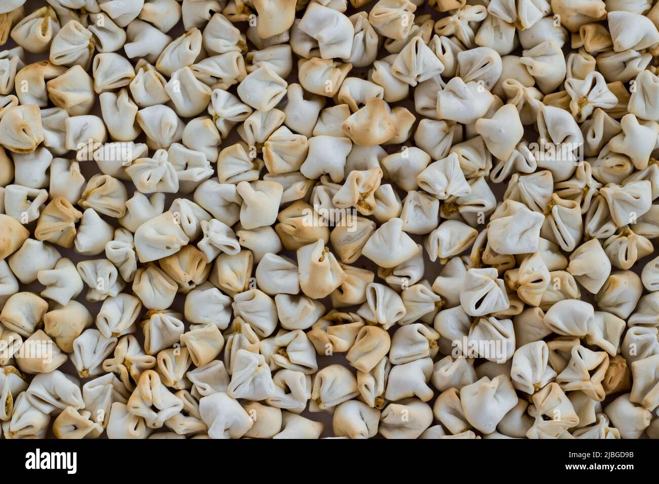 Traditional Turkish Dry Dumplings,Meat Manti ready for cook Stock Photo ...