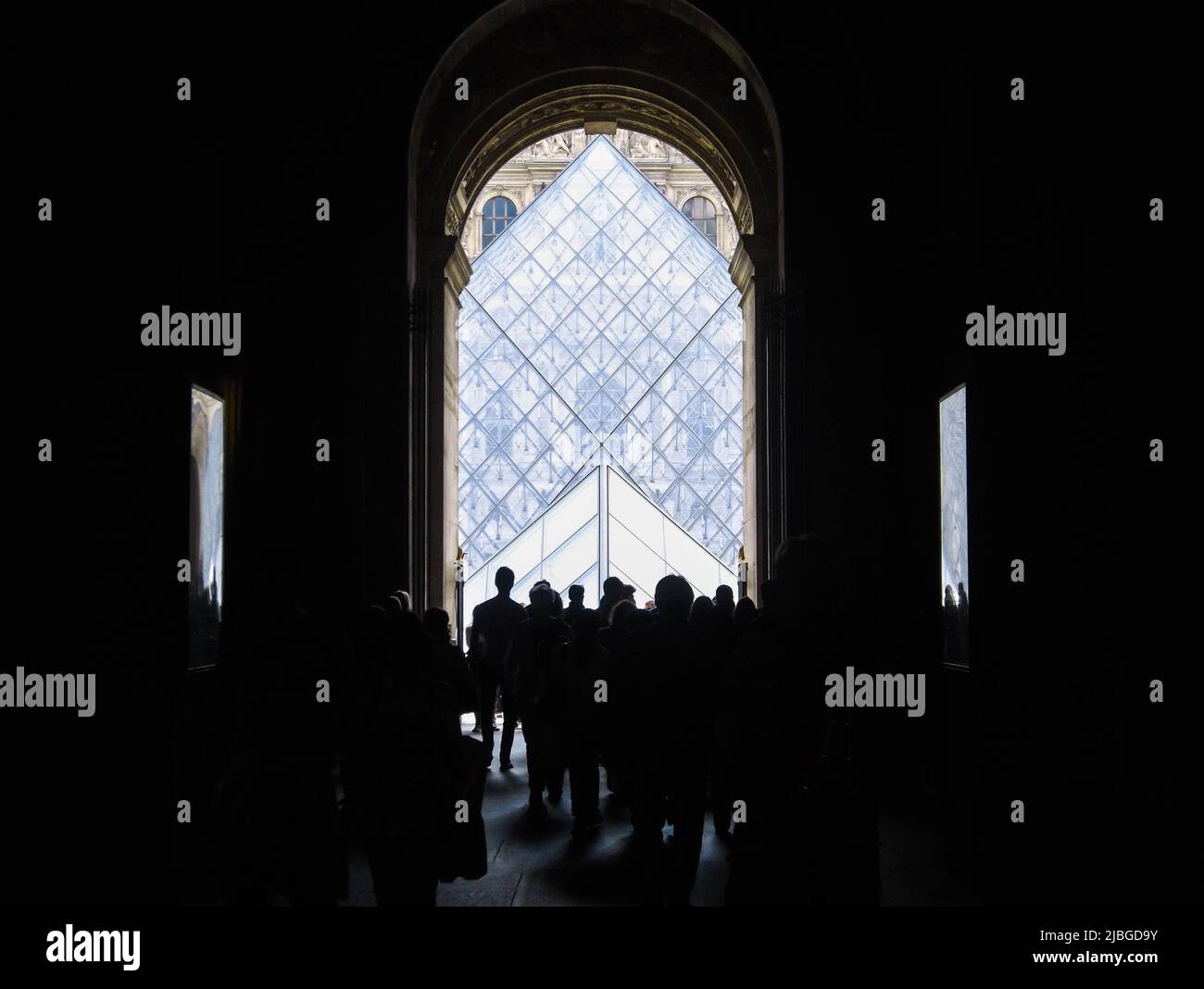 Louvre Museum, Paris, France - June 29, 2011:People entering through ...