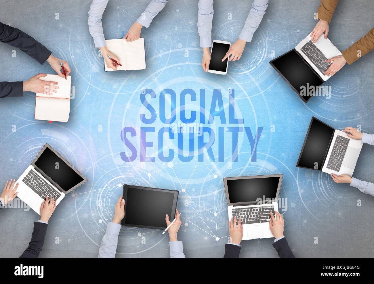 Group of people in front of a laptop, security concept Stock Photo - Alamy