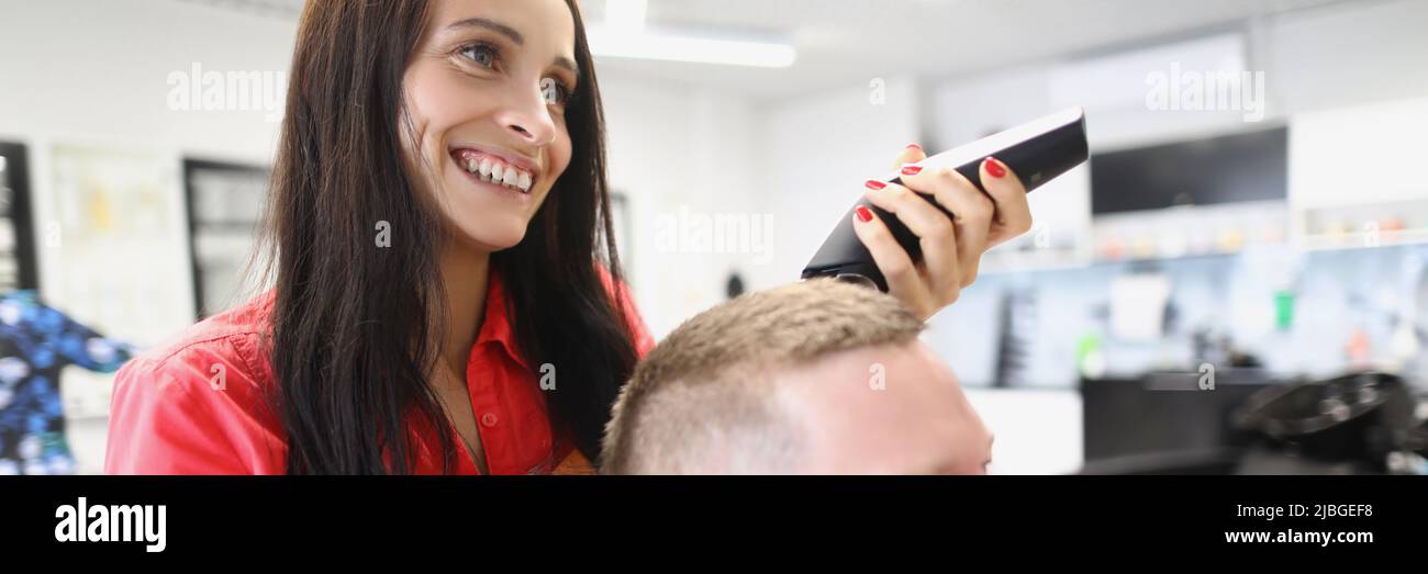 Friendly atmosphere between master and client Stock Photo - Alamy