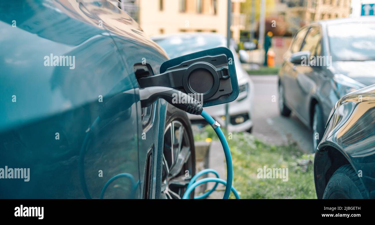 an electric charging station in an underground car park Stock Photo - Alamy