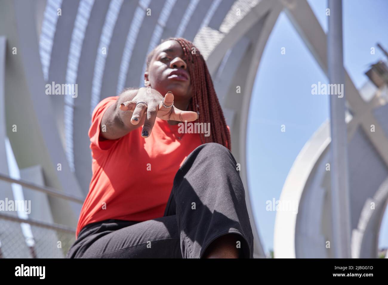 African american woman pointing hi-res stock photography and images - Alamy