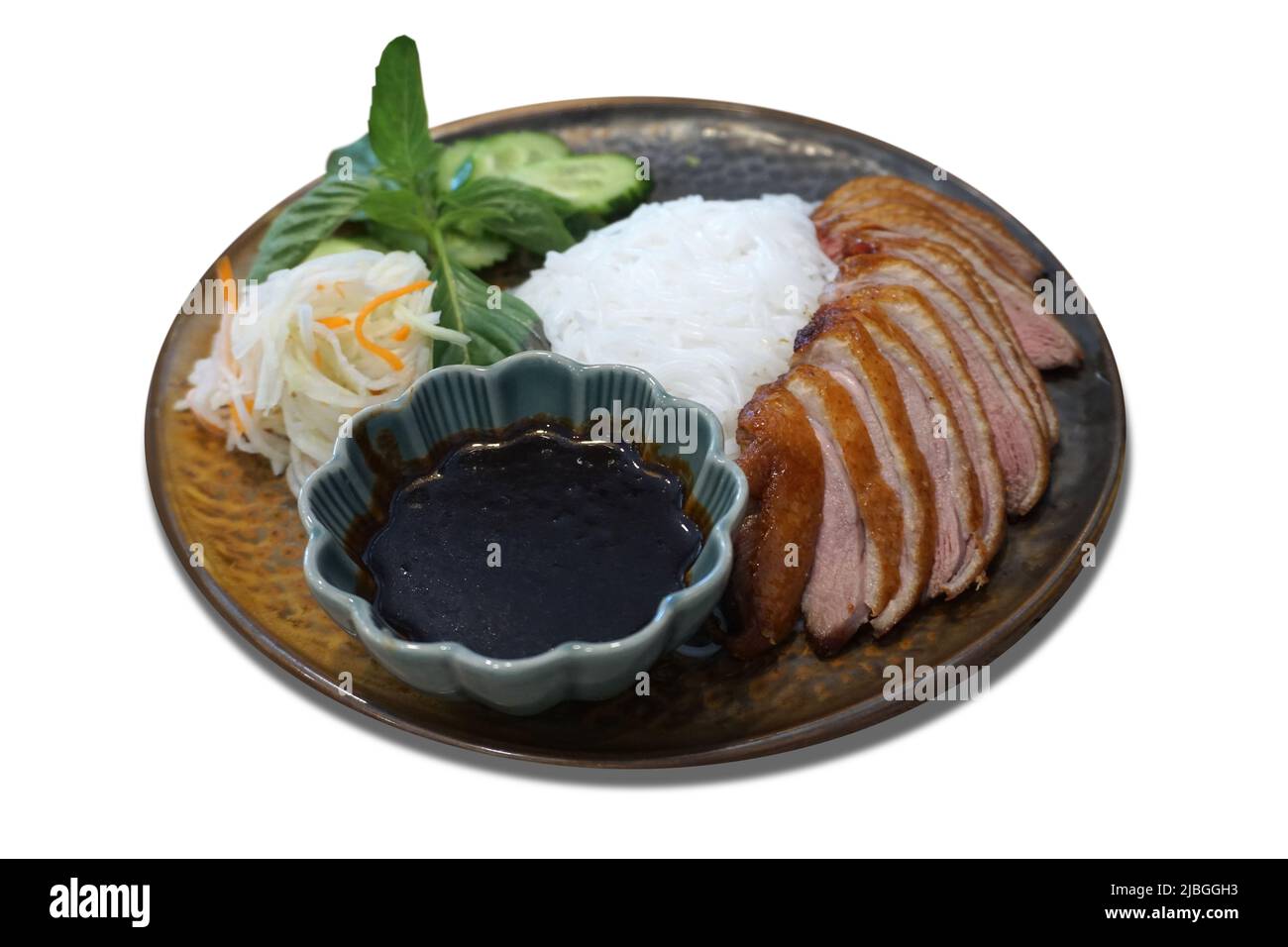 Grilled duck on plate, white background Stock Photo - Alamy