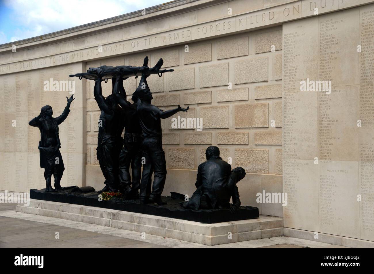 The Armed Forces Memorial with Bronze Statues next to White Portland ...