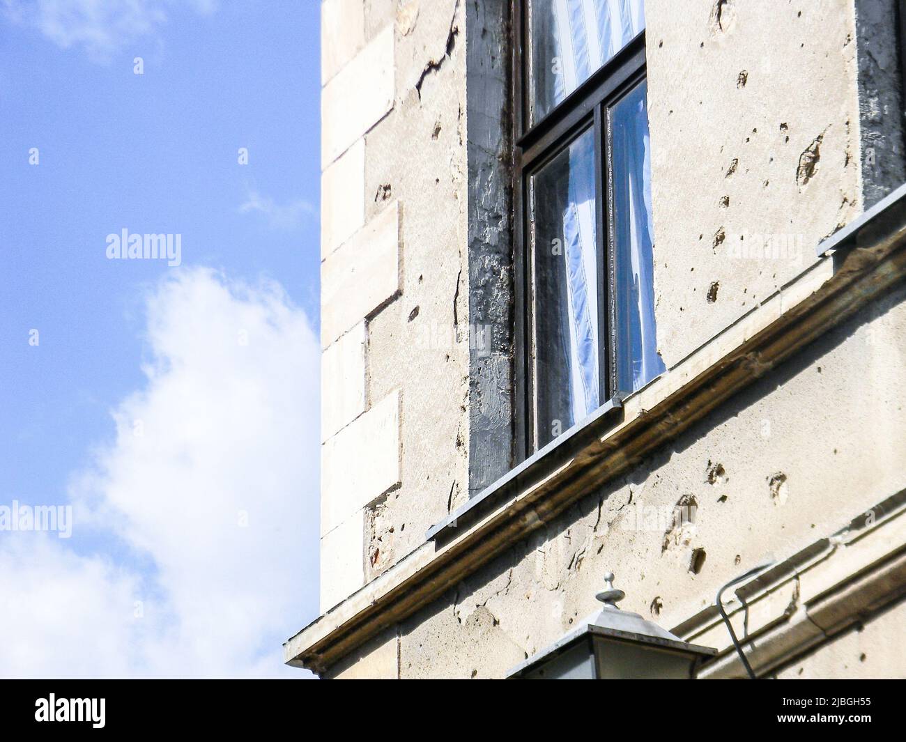 Mostar, Bosnia and Herzegovina at 2011. Old apartment window and ...