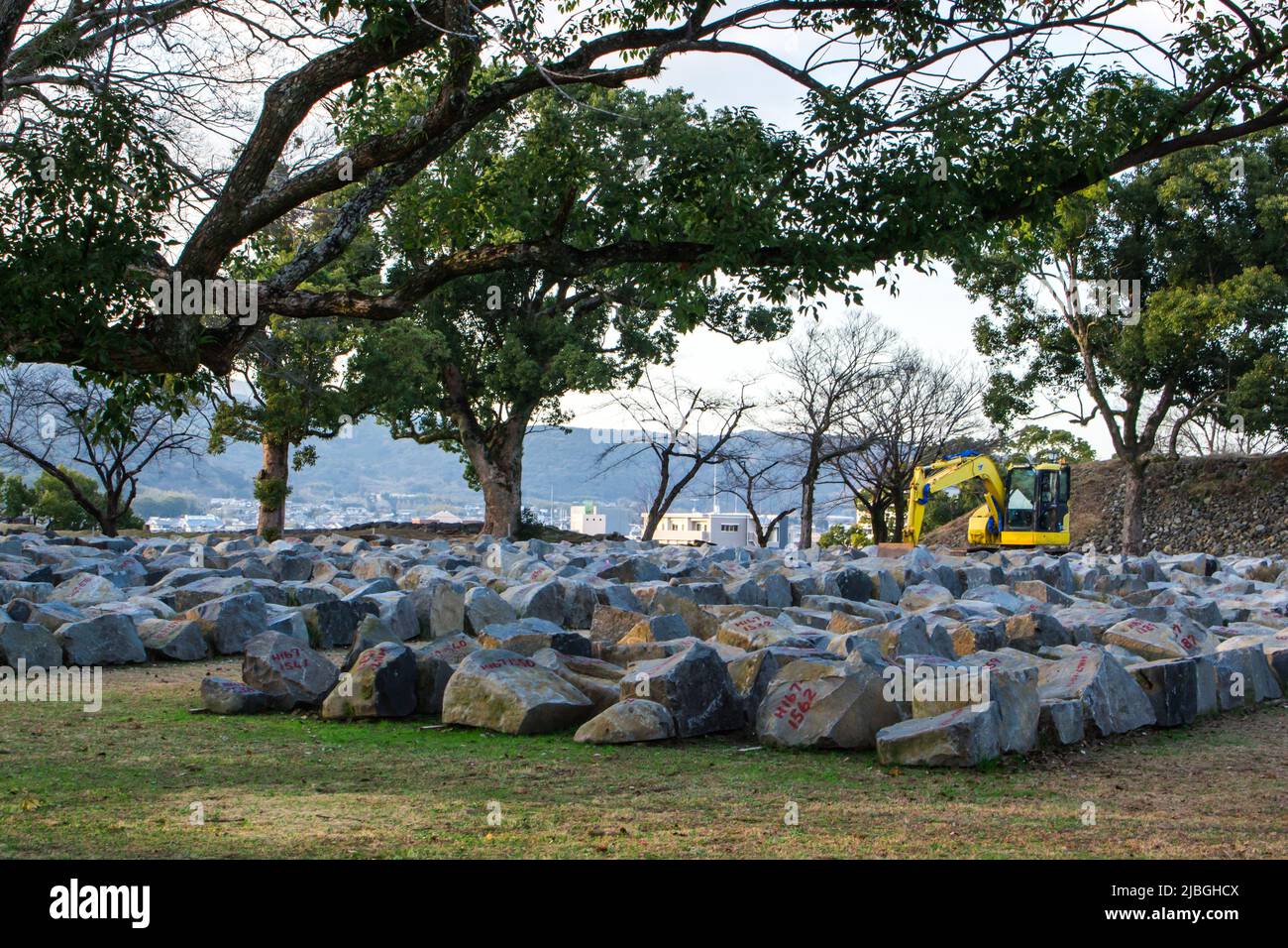 Garden in Kumamoto castle in 2018. The stones are formerly used for ...