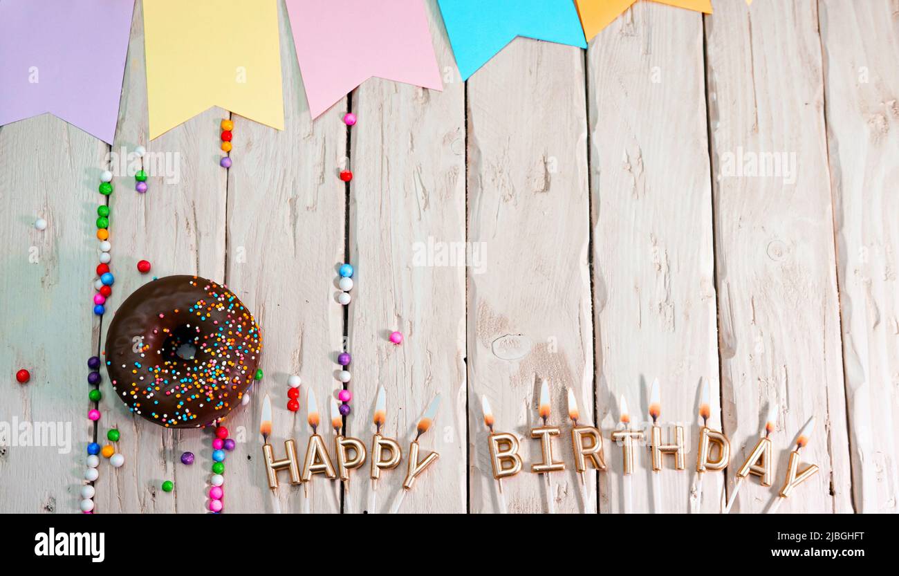 Birthday with number. Donut on the festive table. Happy birthday ...