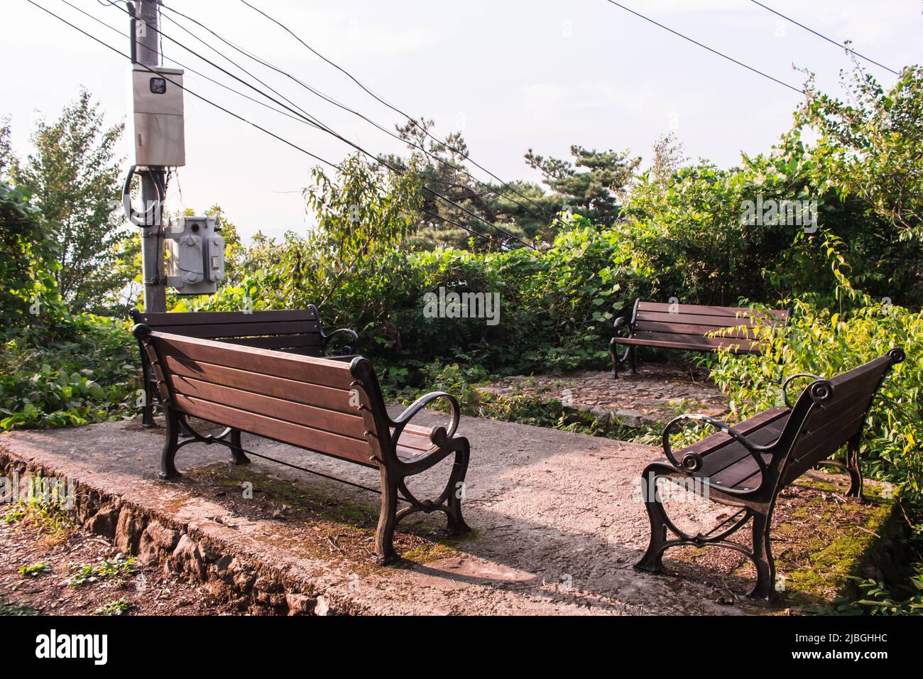 The image of 2 pairs of benches which facing each other in mountain ...