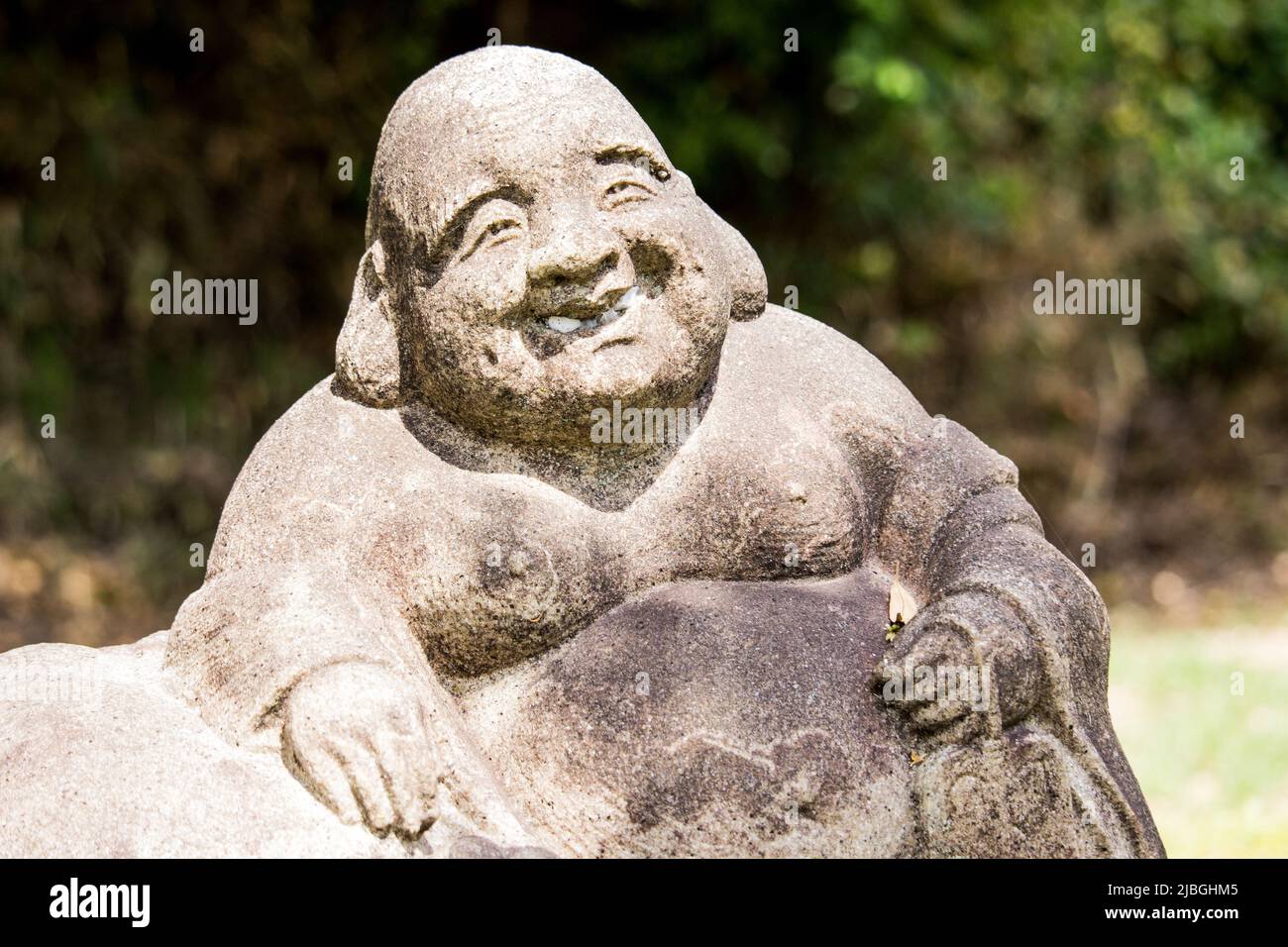 Jizo (Burai / Hotei) by unknown sculptor on the street, Nagoya, Japan ...