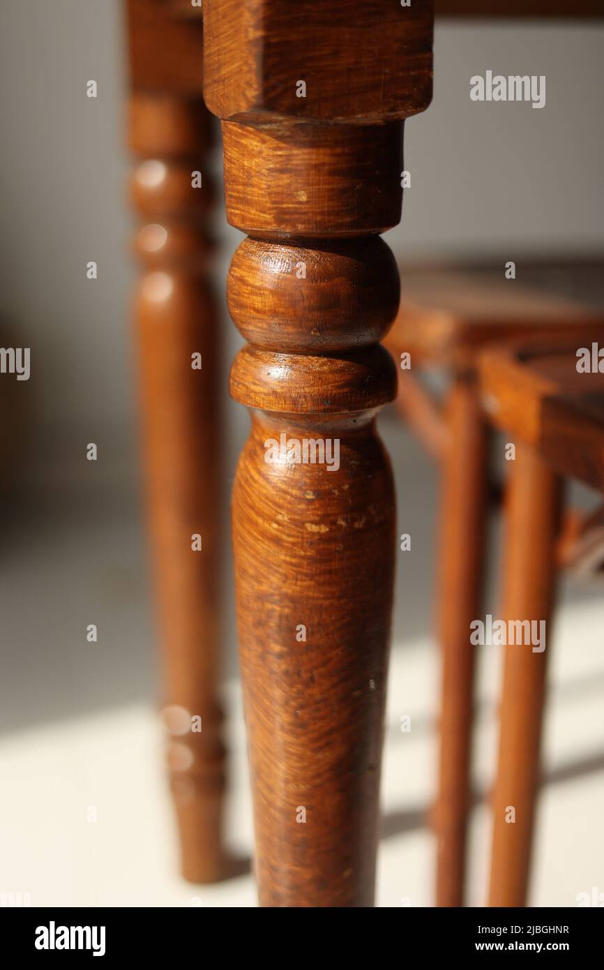 carved wooden legs of chair and table in home interior Stock Photo - Alamy