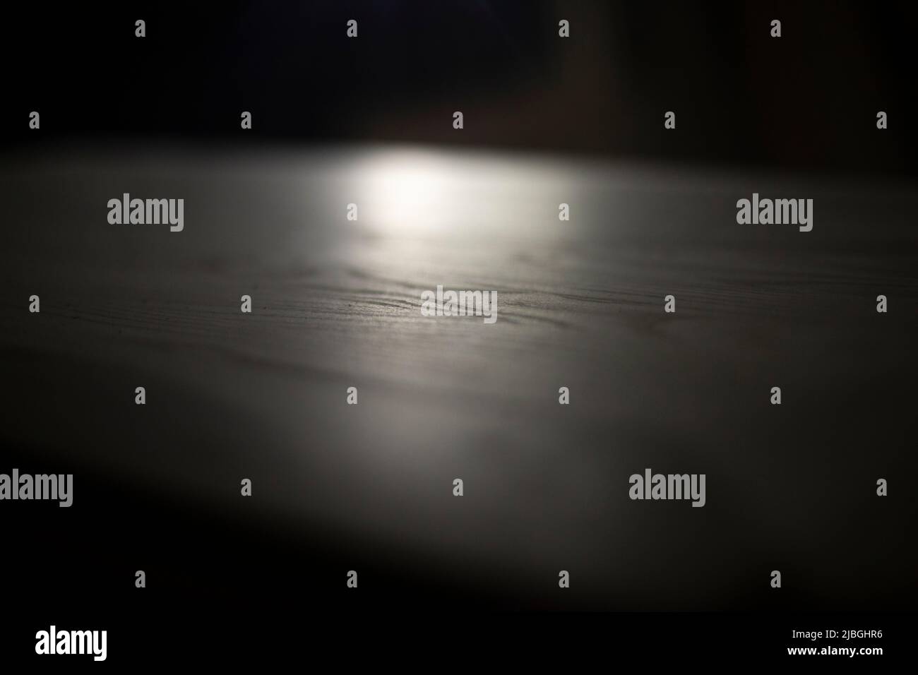Wood in detail. Board is varnished. Surface of table in macro ...