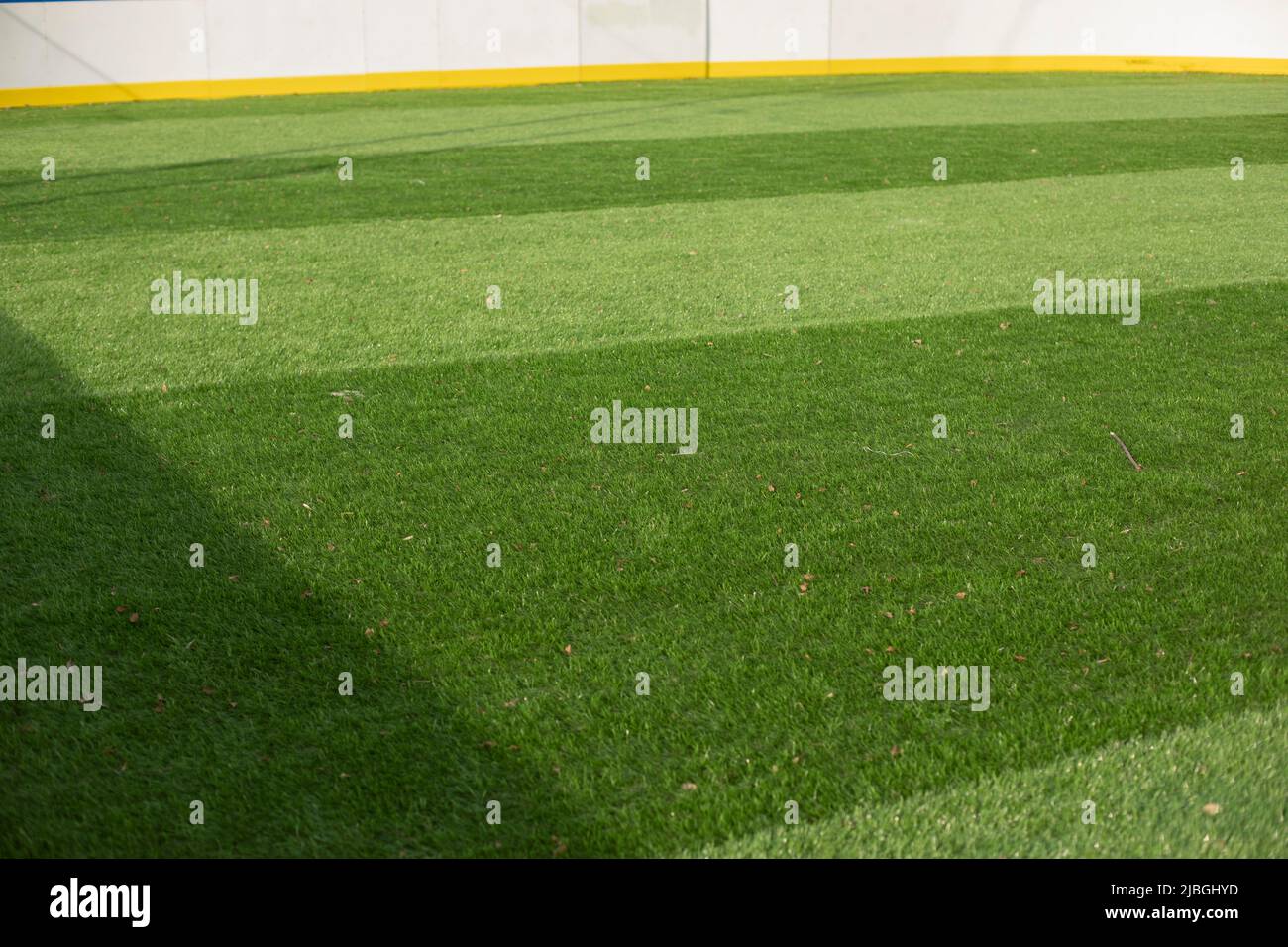 Lawn on football field. Artificial coating on sports ground. Green ...