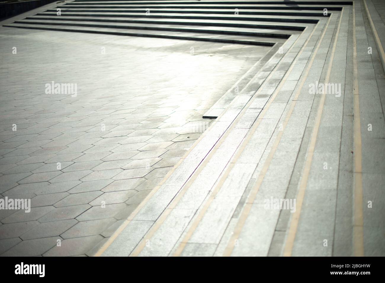 Long stone steps in city. Details of urban environment. Stairs outside ...