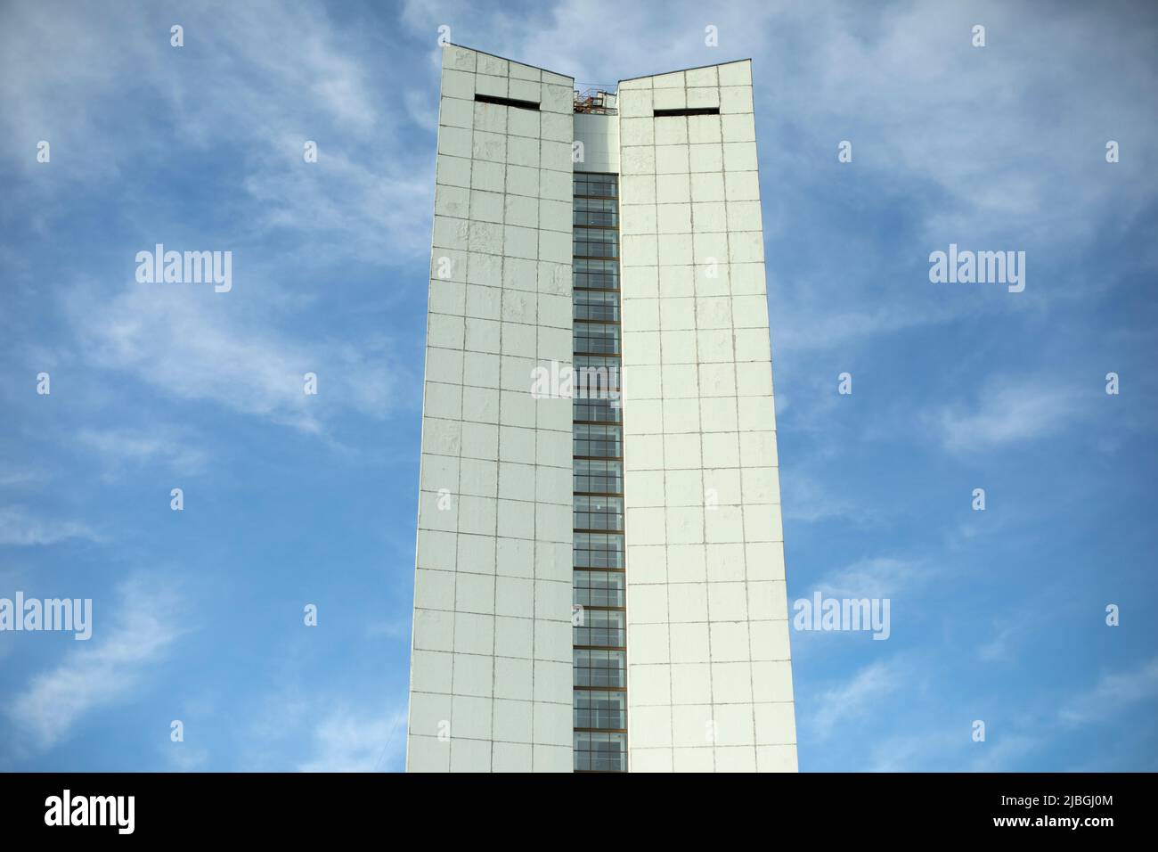 High-rise building in city. Skyscraper among buildings. Office house ...