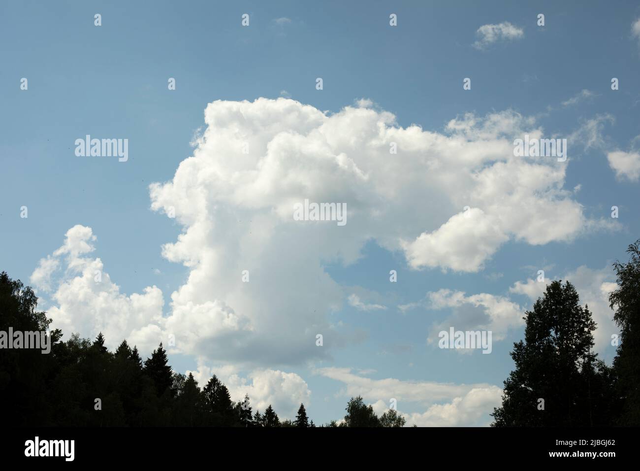 Summer clouds. Celestial landscape. Air masses. Cool weather. Clouds over park Stock Photo - Alamy