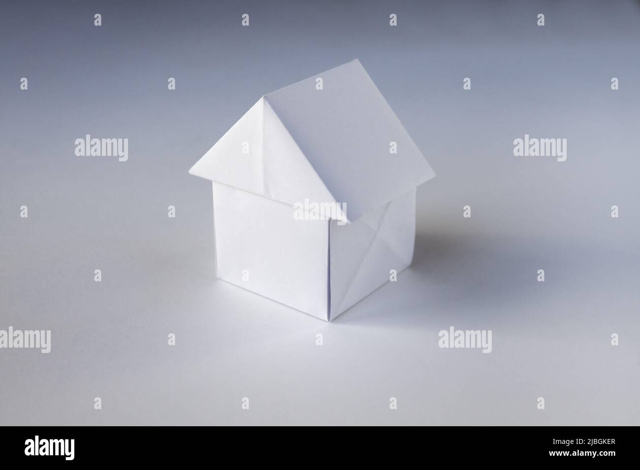 Paper house origami isolated on a blank white background Stock Photo ...