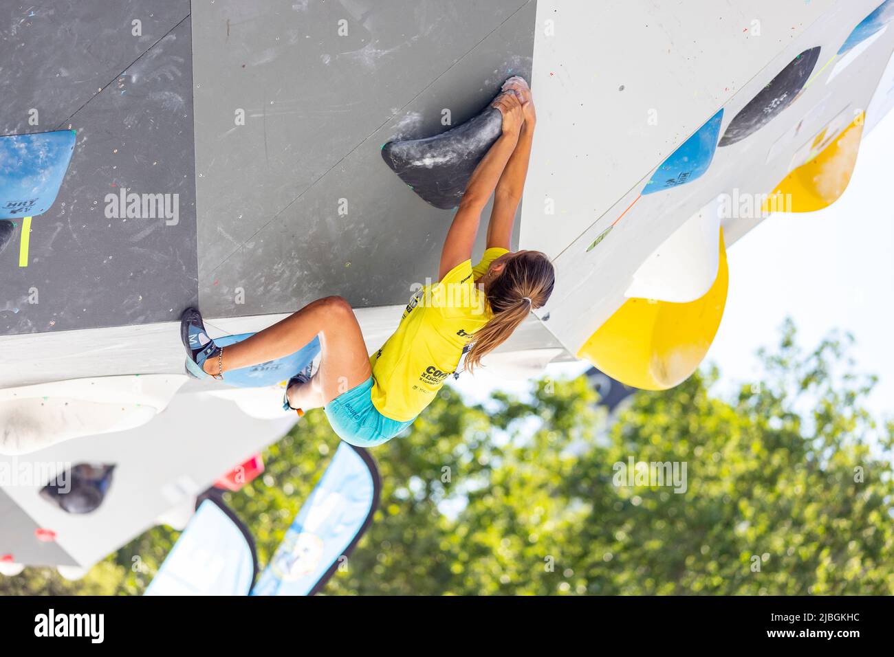 Climbing. Sport. Young person climbing in Block Climbing. Olympic ...