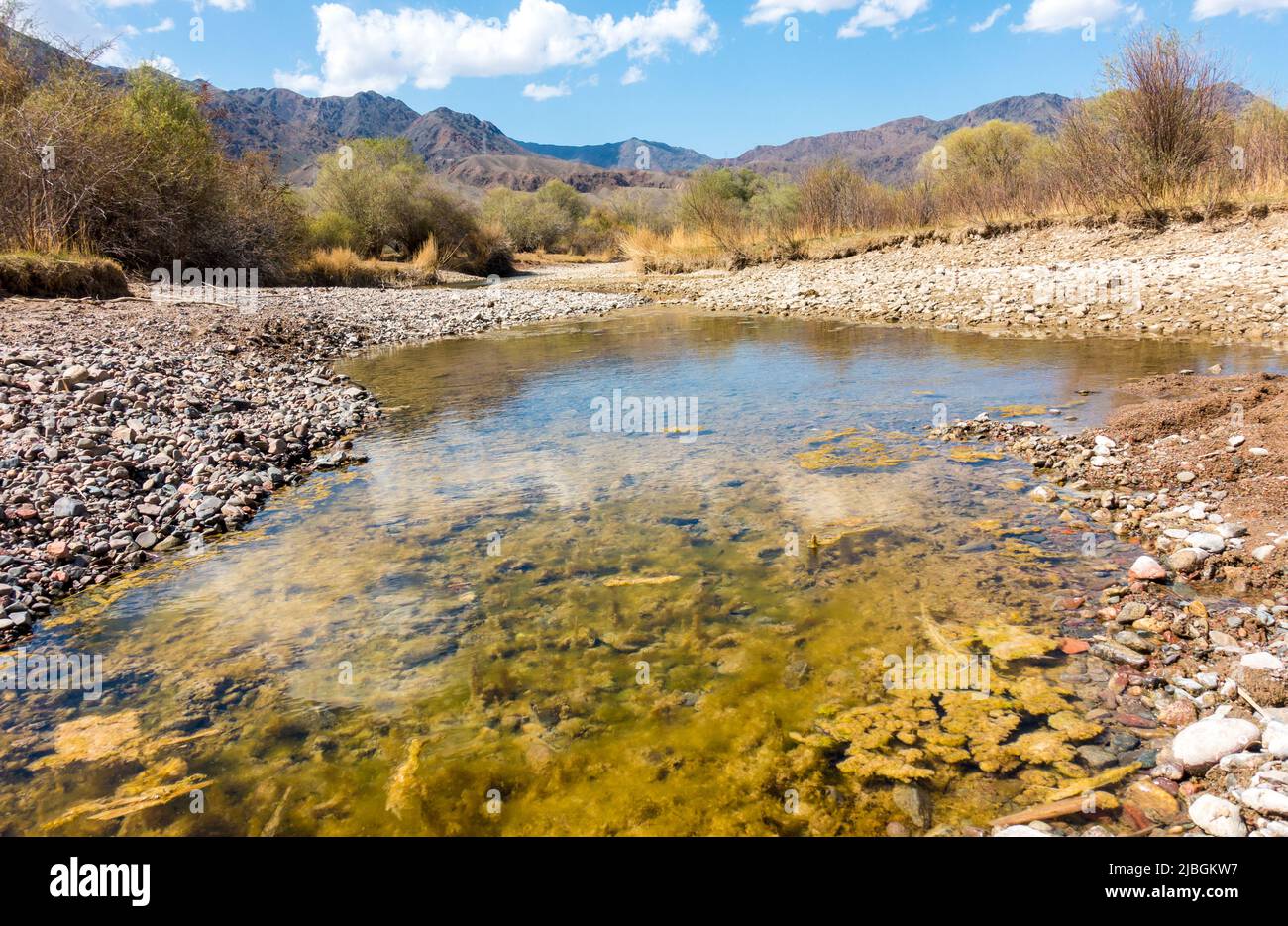 River among the mountains. Calm transparent ovda. Summer landscape ...