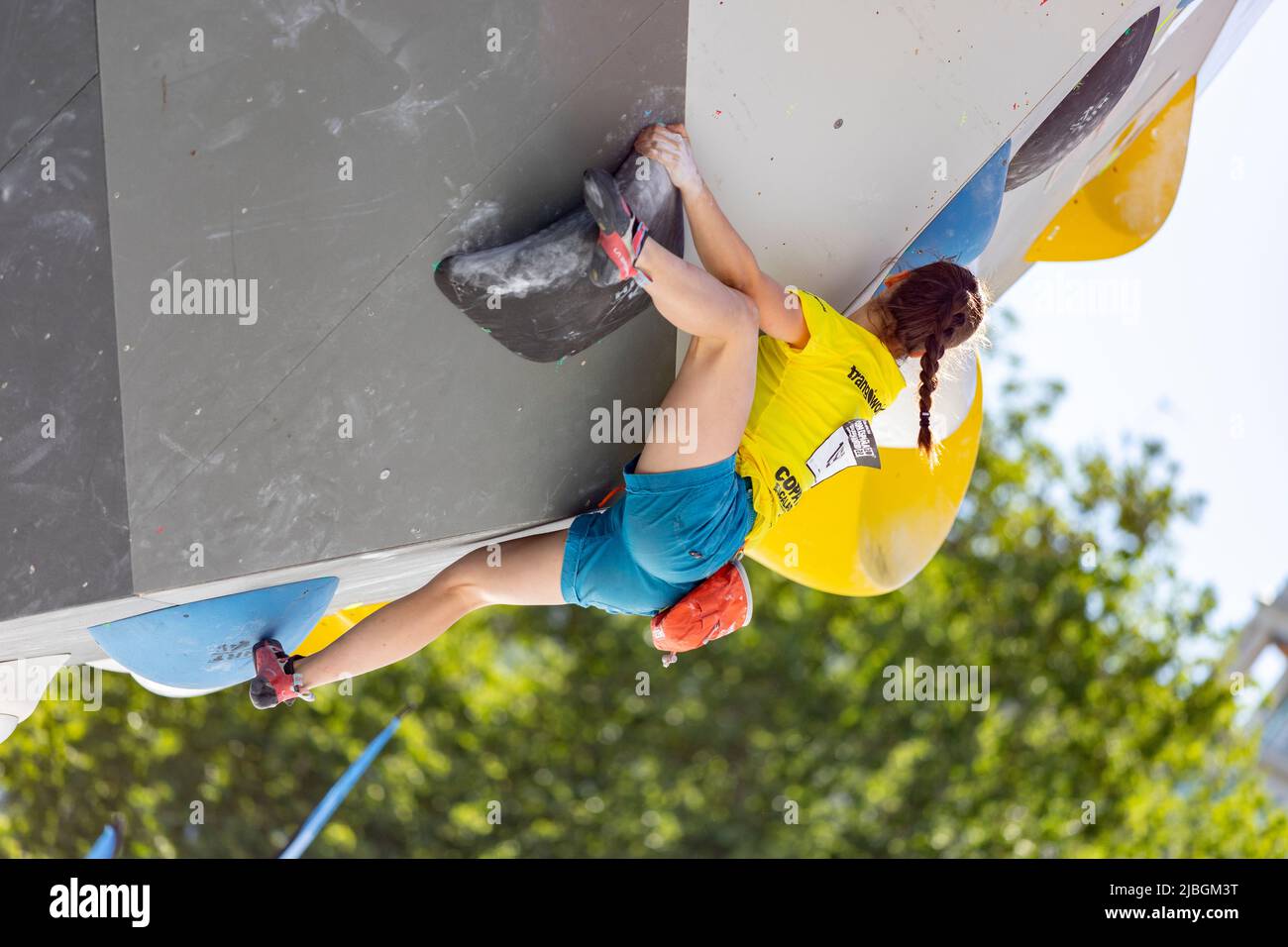 Climbing. Sport. Young person climbing in Block Climbing. Olympic ...