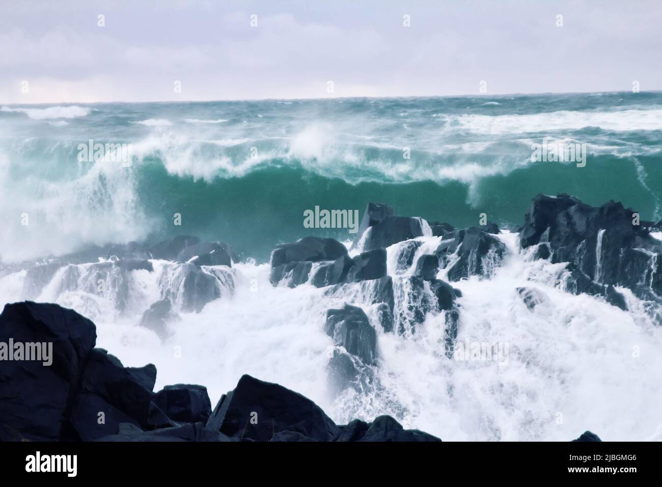 Rolling storm waves and rocky reefs. Pacific Ocean. Aleutian-Commander ...
