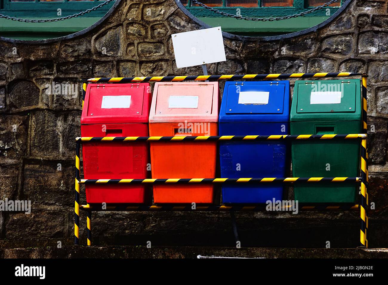 Mailboxes of different colors and purposes Stock Photo - Alamy