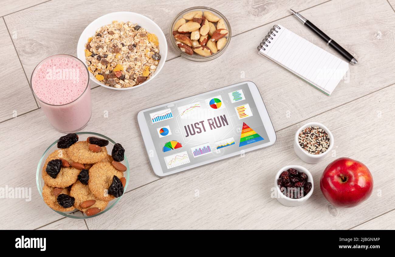 Organic food and tablet pc Stock Photo - Alamy