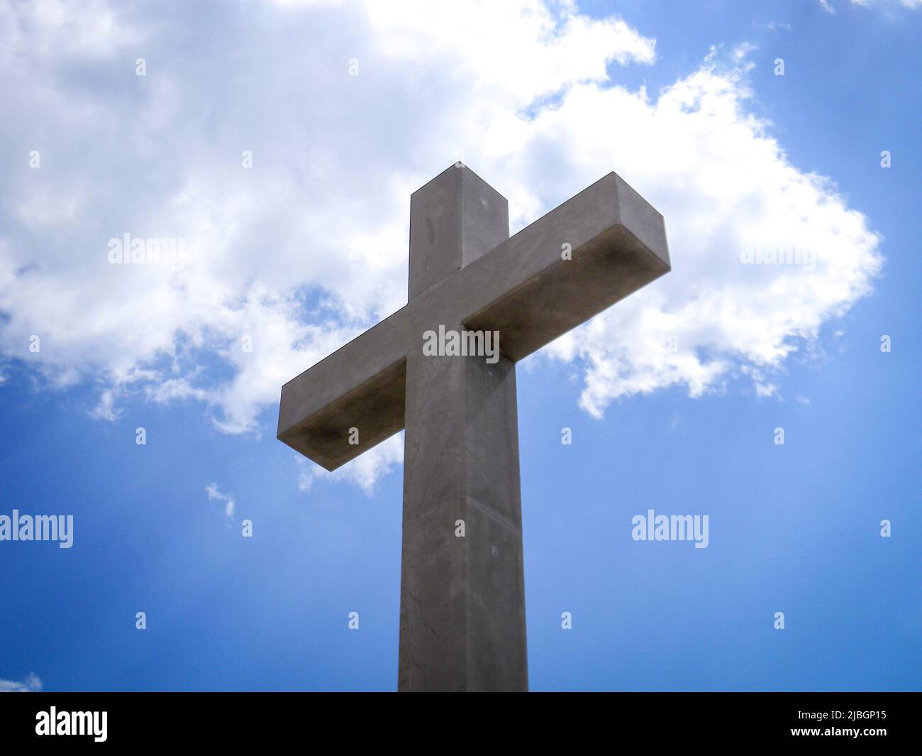 Isolated cross image with blue sky background Stock Photo - Alamy