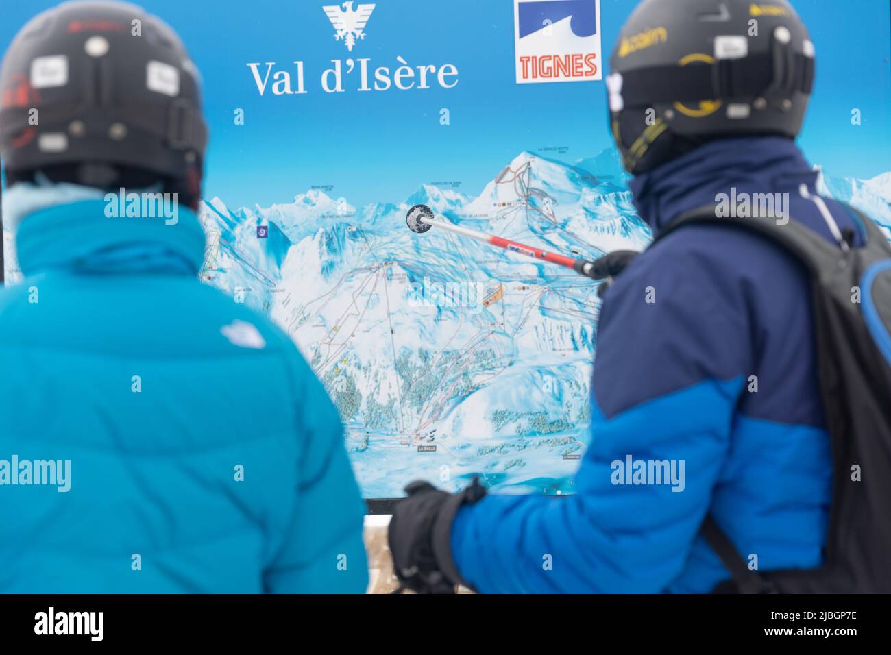 People looking at Piste Map in Val d’Isère Ski Resort in the French ...