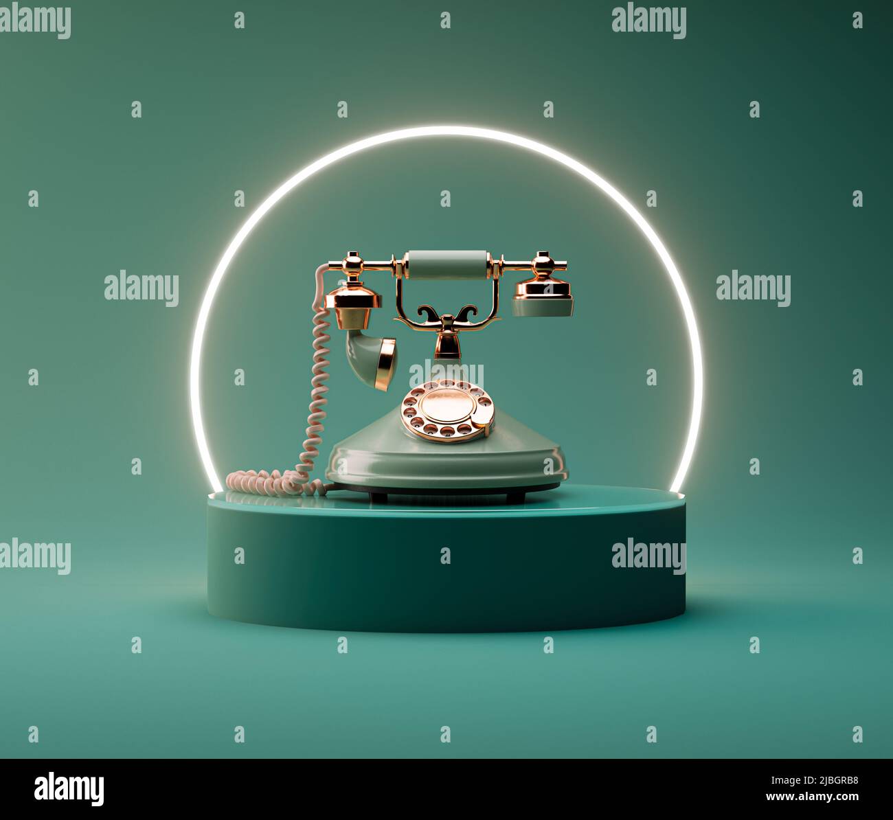 A vintage aquamarine and brass art deco telephone on a round green ...