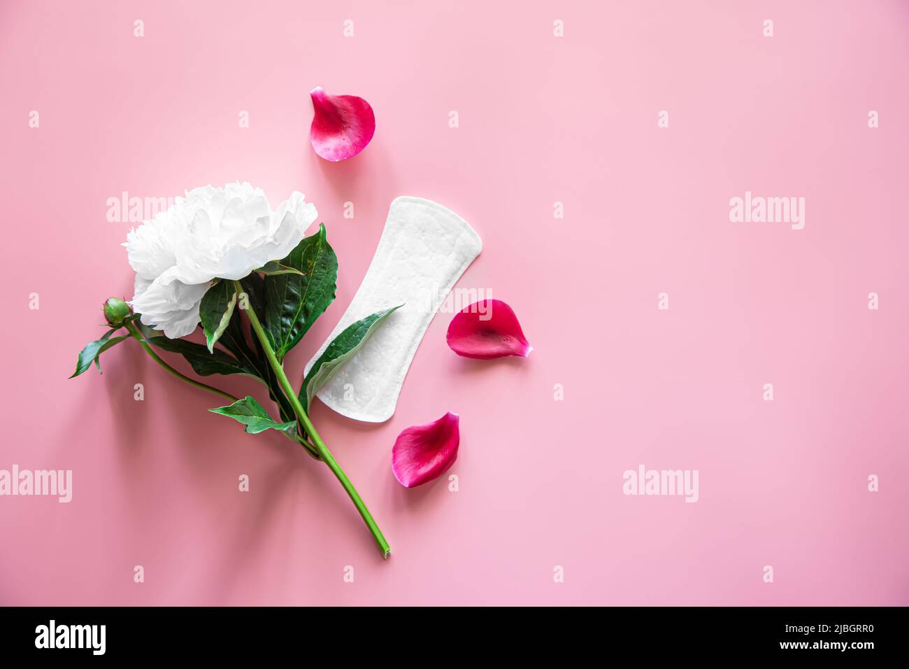 Women's pad and flower, flat lay, women's health and menstruation ...