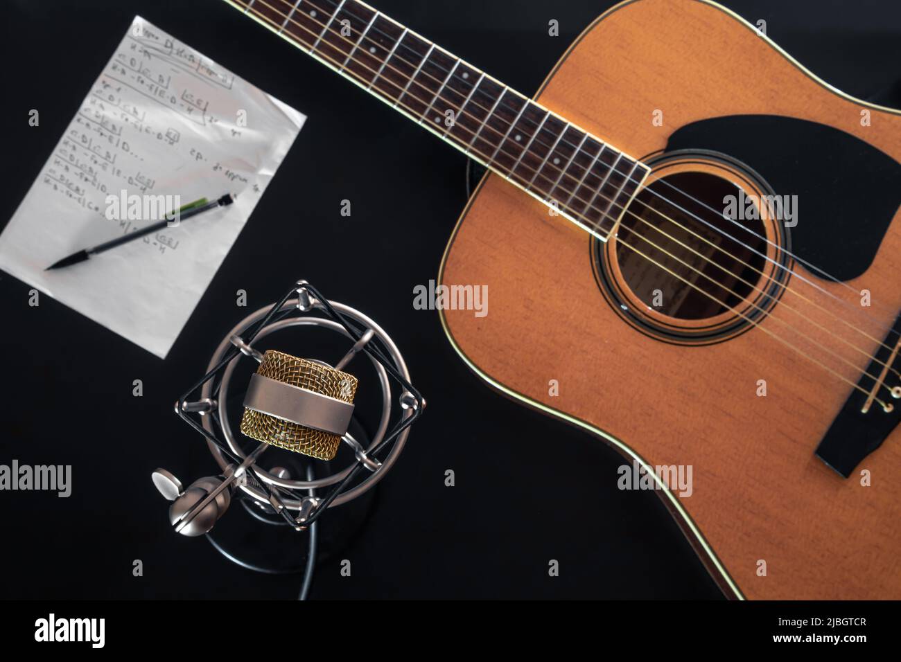 Flat lay, music background with acoustic guitar Stock Photo - Alamy