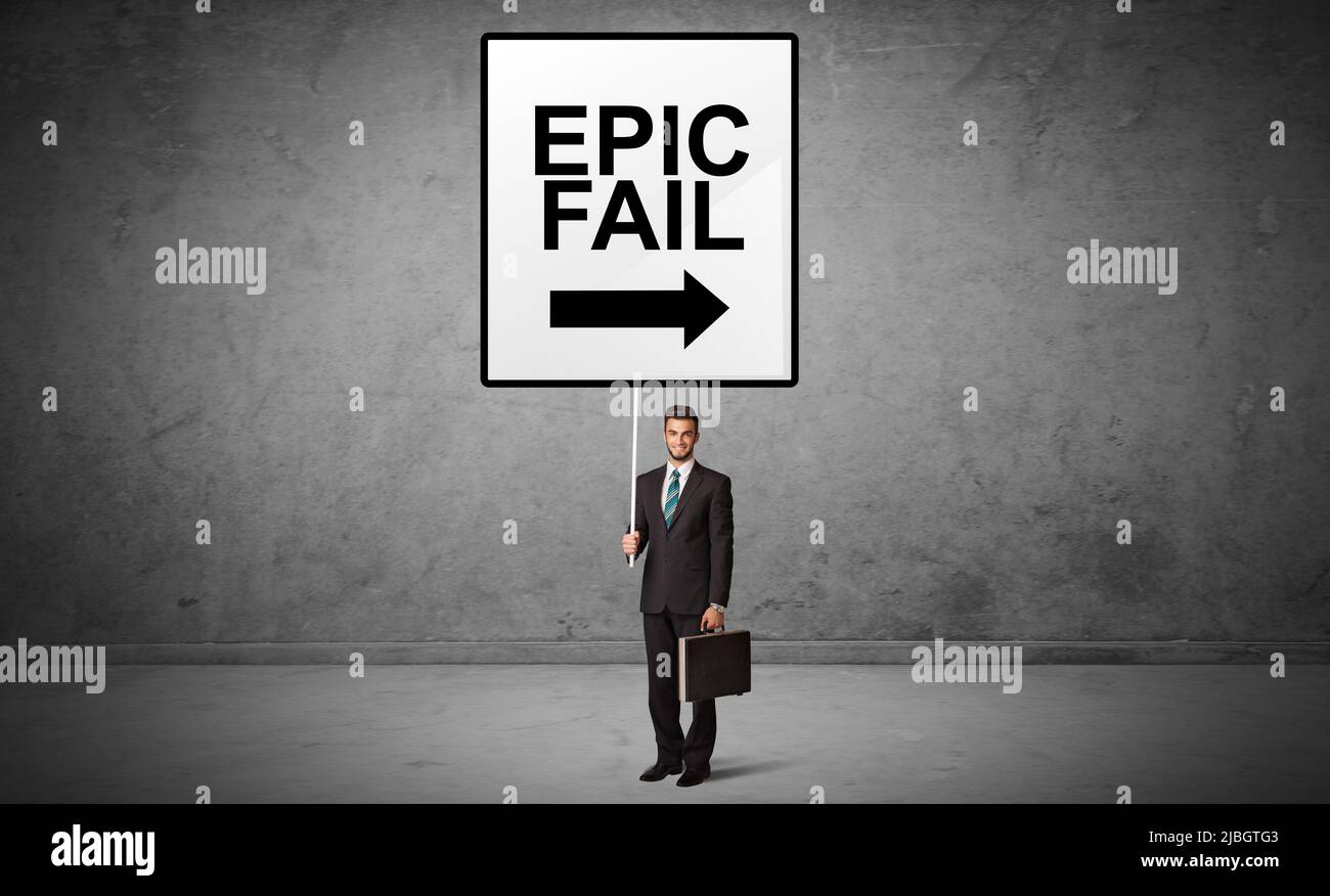 business person holding a traffic sign Stock Photo - Alamy