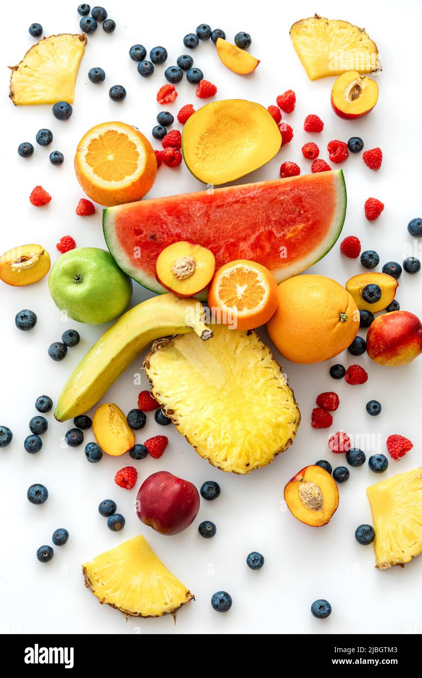 Tropical fruits on a white background top view Stock Photo - Alamy