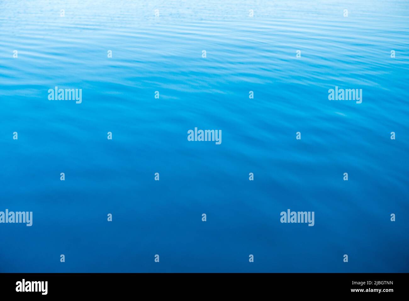 Clear water texture in blue and orange. Background of the ocean and the ...