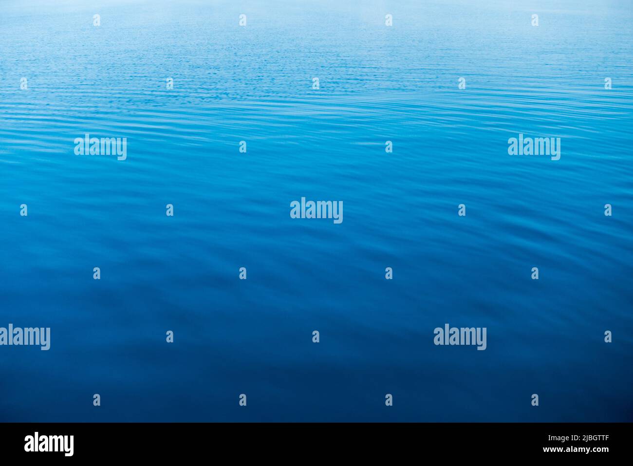 Clear water texture in blue and orange. Background of the ocean and the ...