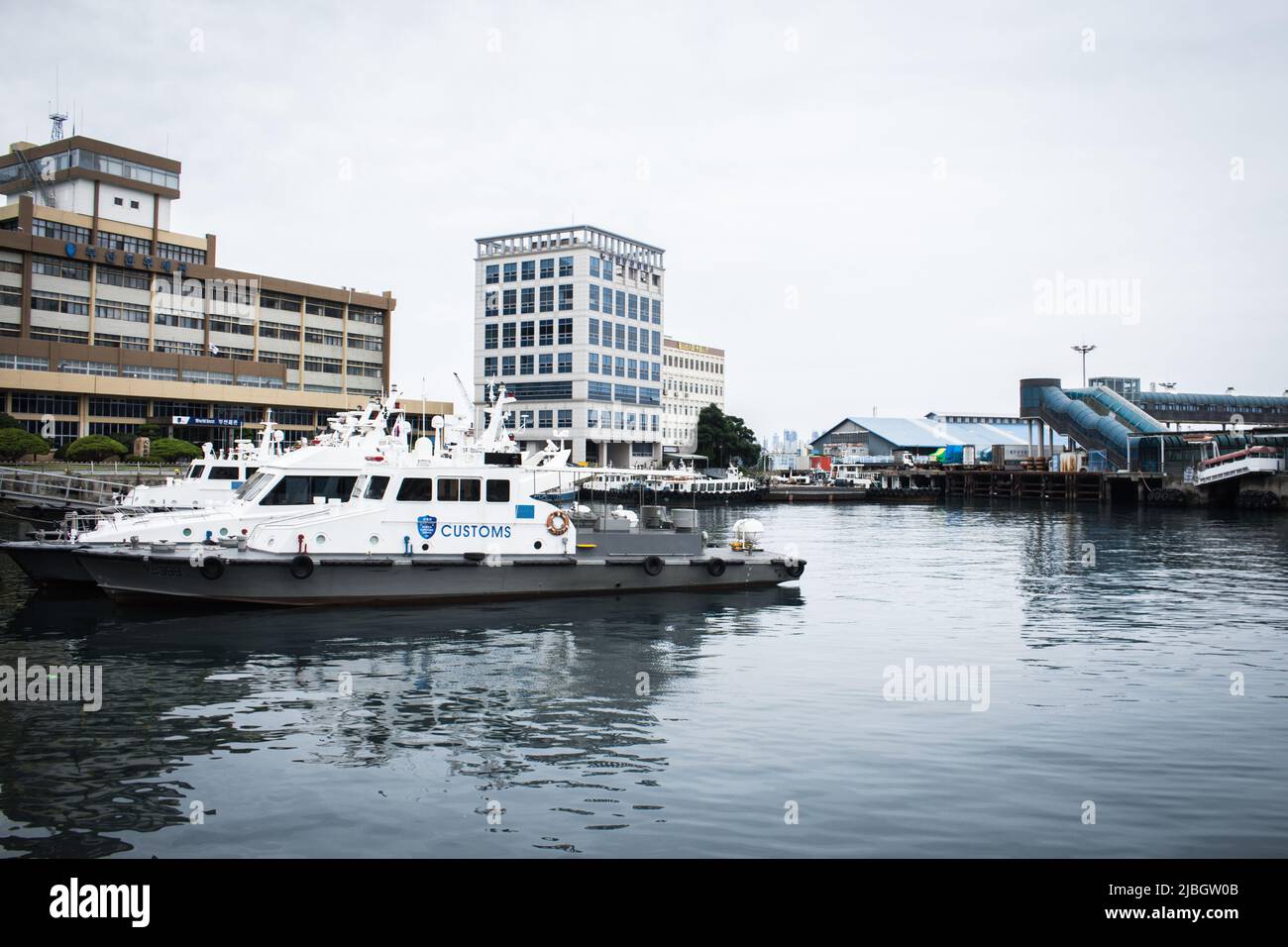 The Port of Busan in cloudy day. It is the largest port in South Korea ...